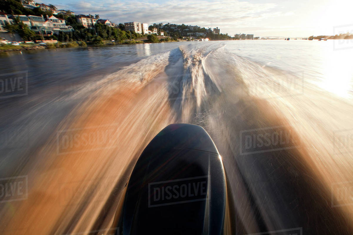 Speedboat prop wash wake in the river - Stock Photo - Dissolve