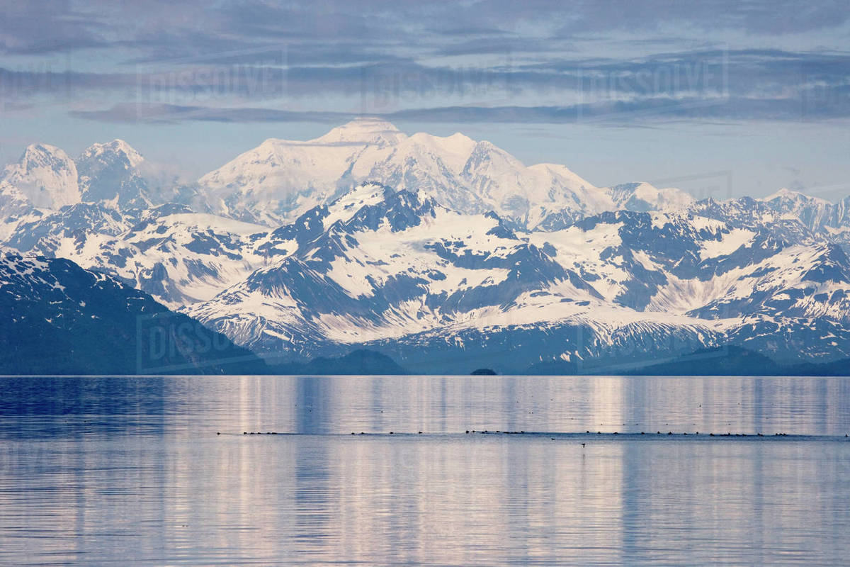 Reflection of mountains in water, Fairweather Range, Glacier Bay ...