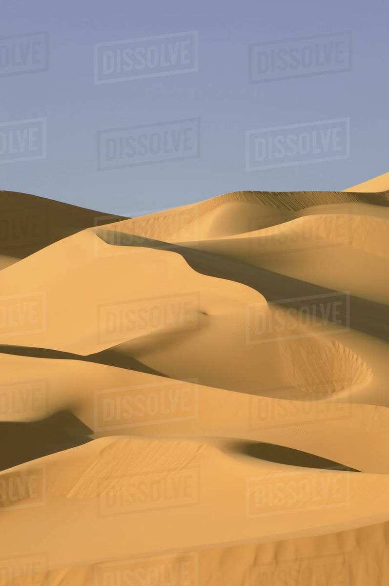 Sand dunes in a desert, Erg Awbari, Fezzan, Libya - Stock Photo - Dissolve