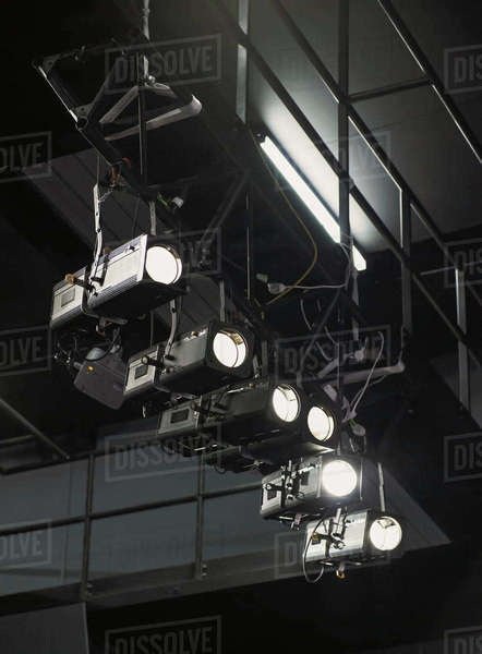 Row of spotlights overhead in theatre - Royalty-free Stock Photo | Dissolve