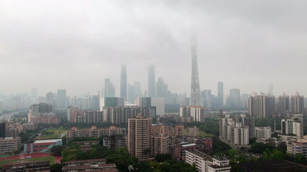 Guangzhou cityscape rain clouds timelapse pan up - Stock Video Footage ...