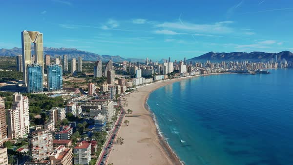 Spanish city Benidorm buildings and sandy beach Poniente. Aerial view ...