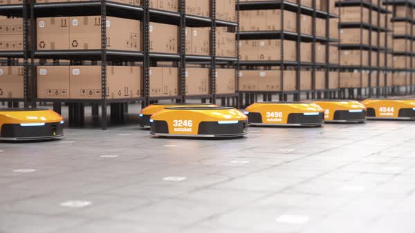Row of autonomous robots start moving shelves with cardboard boxes in ...