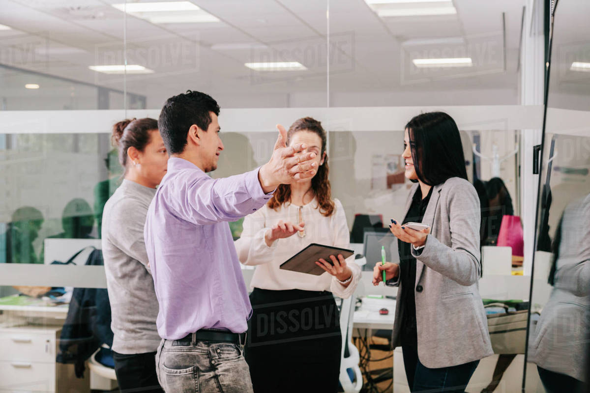 Group of office workers at a meeting around the boss - Stock Photo ...