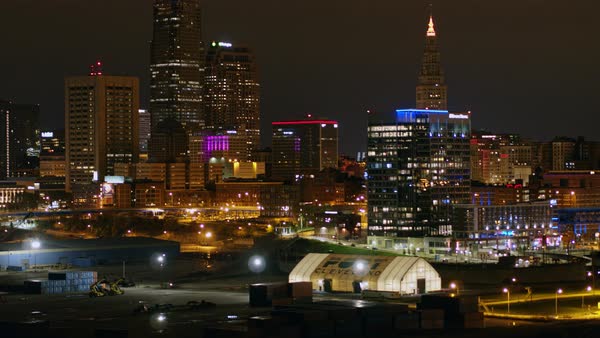 Cleveland Ohio Aerial - Panning around industrial waterfront at night ...