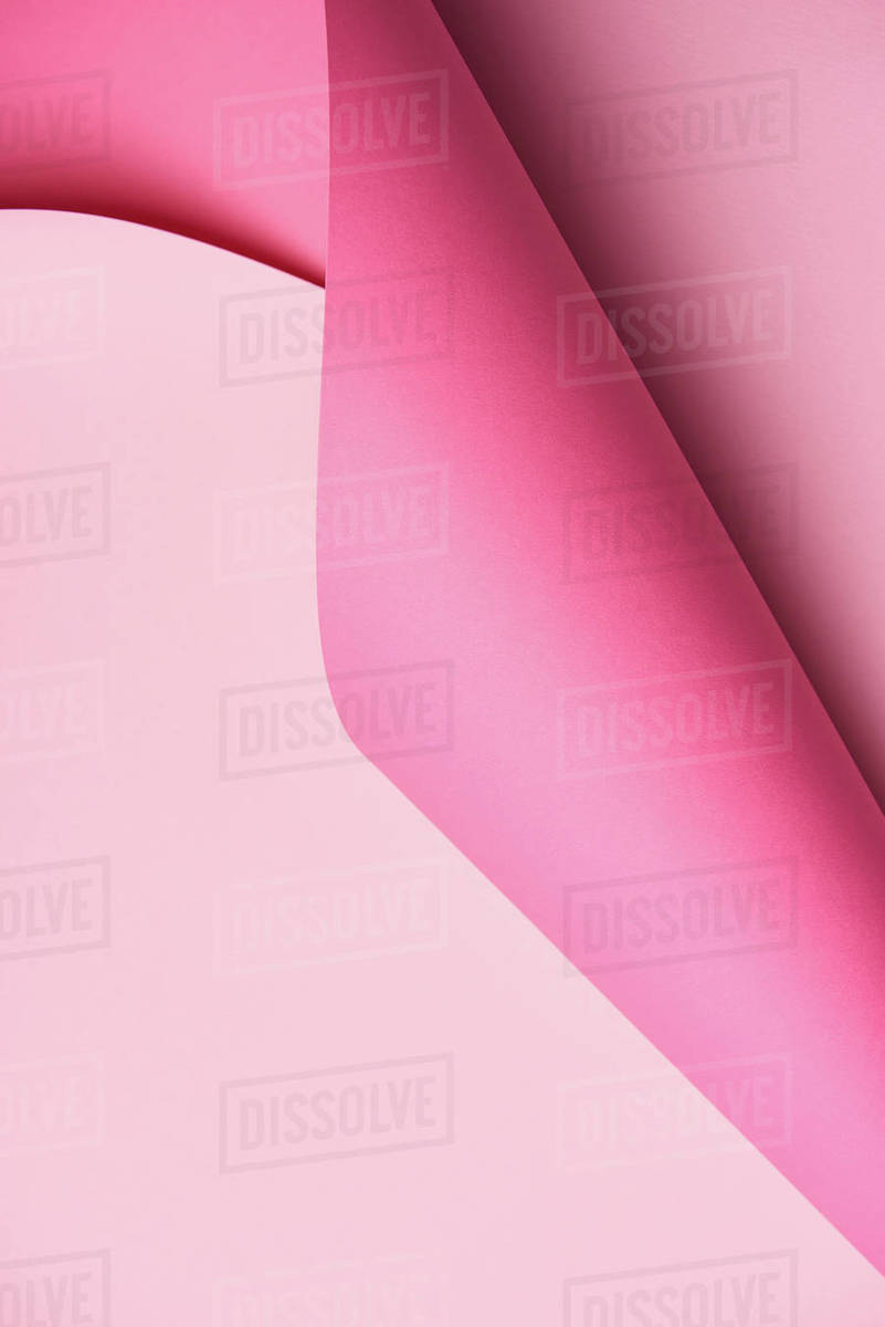Close-up view of beautiful creative abstract pink paper background ...