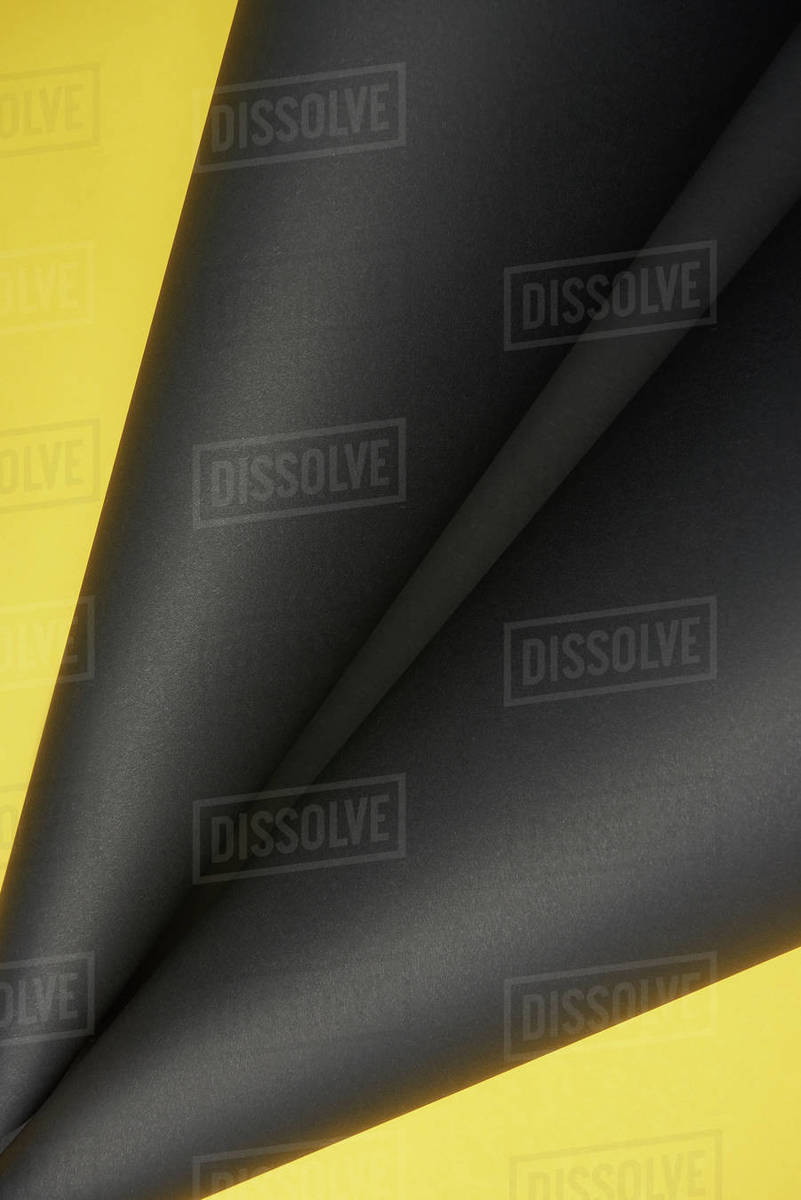Close-up view of abstract yellow and black paper background - Stock ...