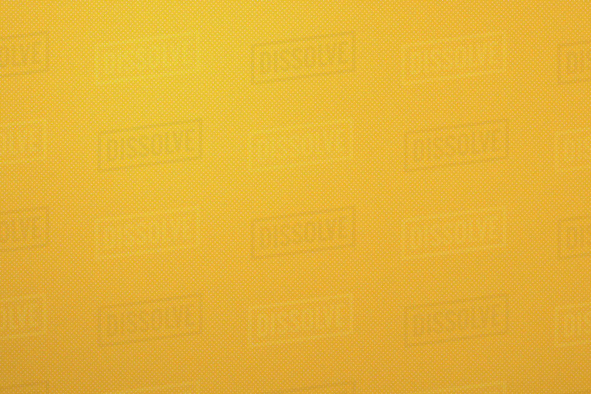 Top view of yellow surface with tiny white polka dot pattern for ...