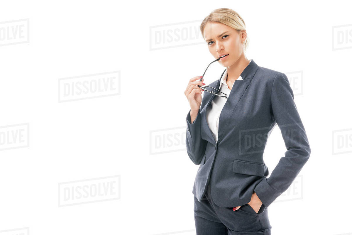 confident young businesswoman looking at camera with thoughtful ...