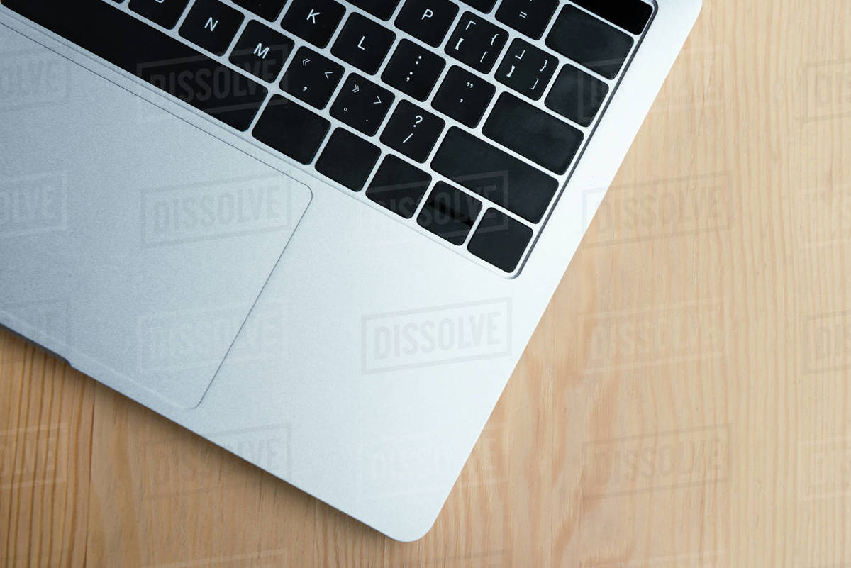 top view of laptop computer keyboard on wooden table - Royalty-free ...