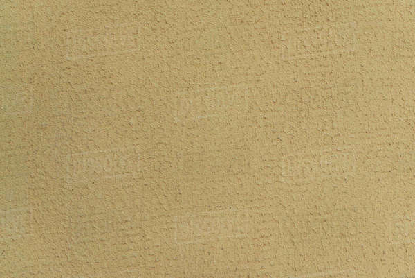 Full frame view of light brown concrete background - Stock Photo - Dissolve