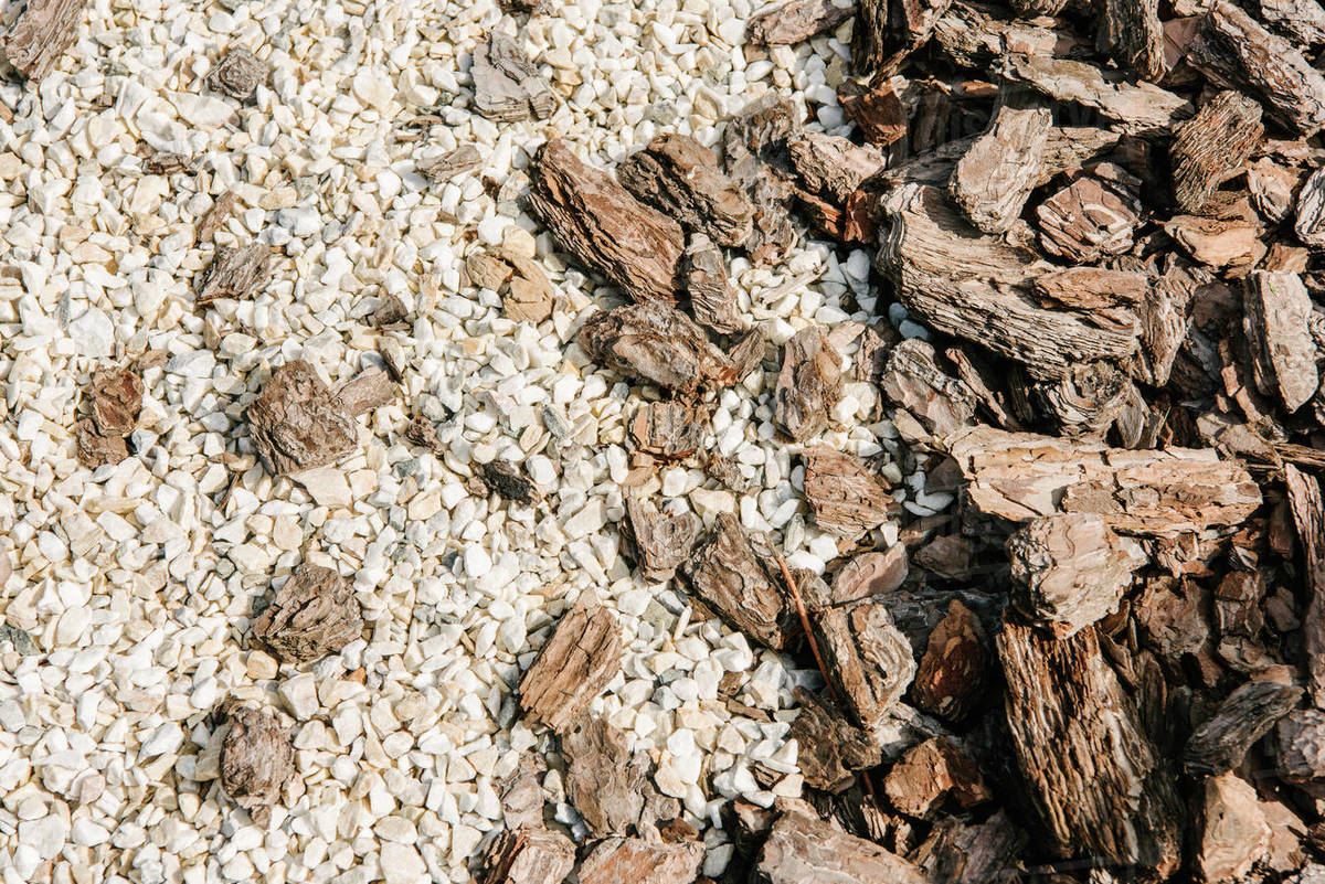 Pieces of wooden bark and white pebbles for background - Royalty-free ...