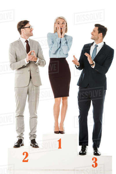 businessmen applauding to winner while standing on winners podium ...