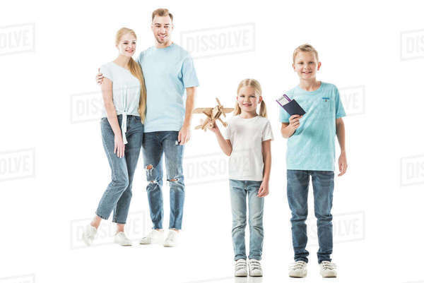 Happy parents smiling and looking at kids isolated on white - Royalty ...