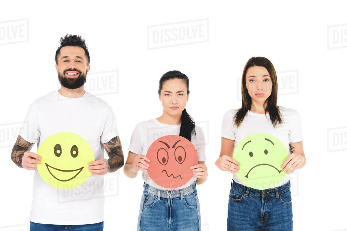 Group of young people holding colored cards with angry, sad and happy ...