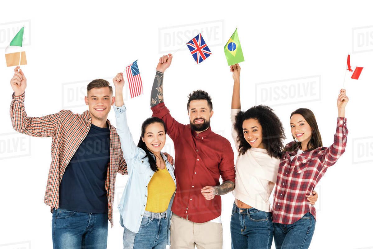 Multiethnic group of people smiling with flags of different countries ...