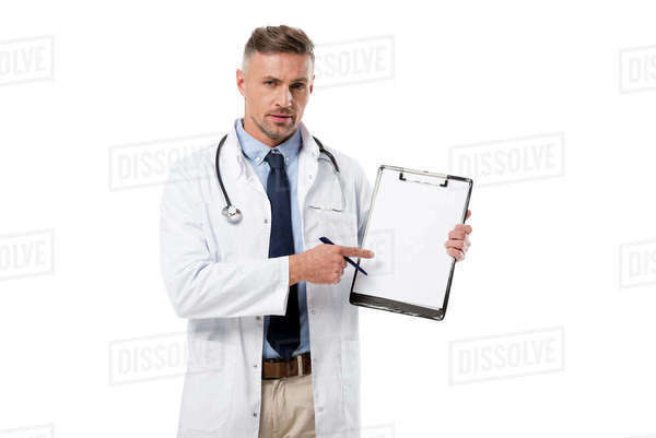 Serious doctor with pen looking at camera and pointing at diagnosis ...