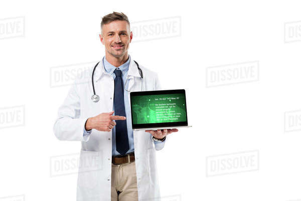 Handsome doctor pointing at laptop with health data on screen isolated ...