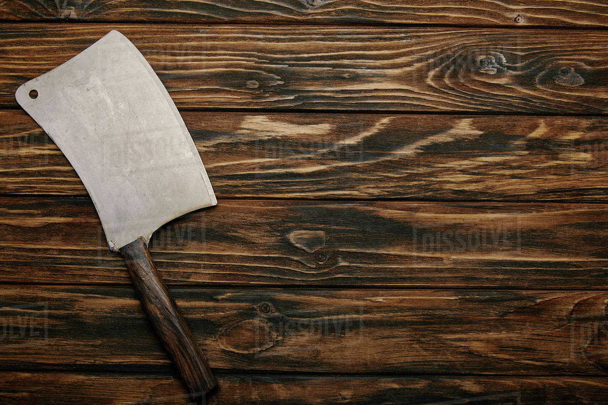 Top view of butcher knife on wooden background - Royalty-free Stock ...