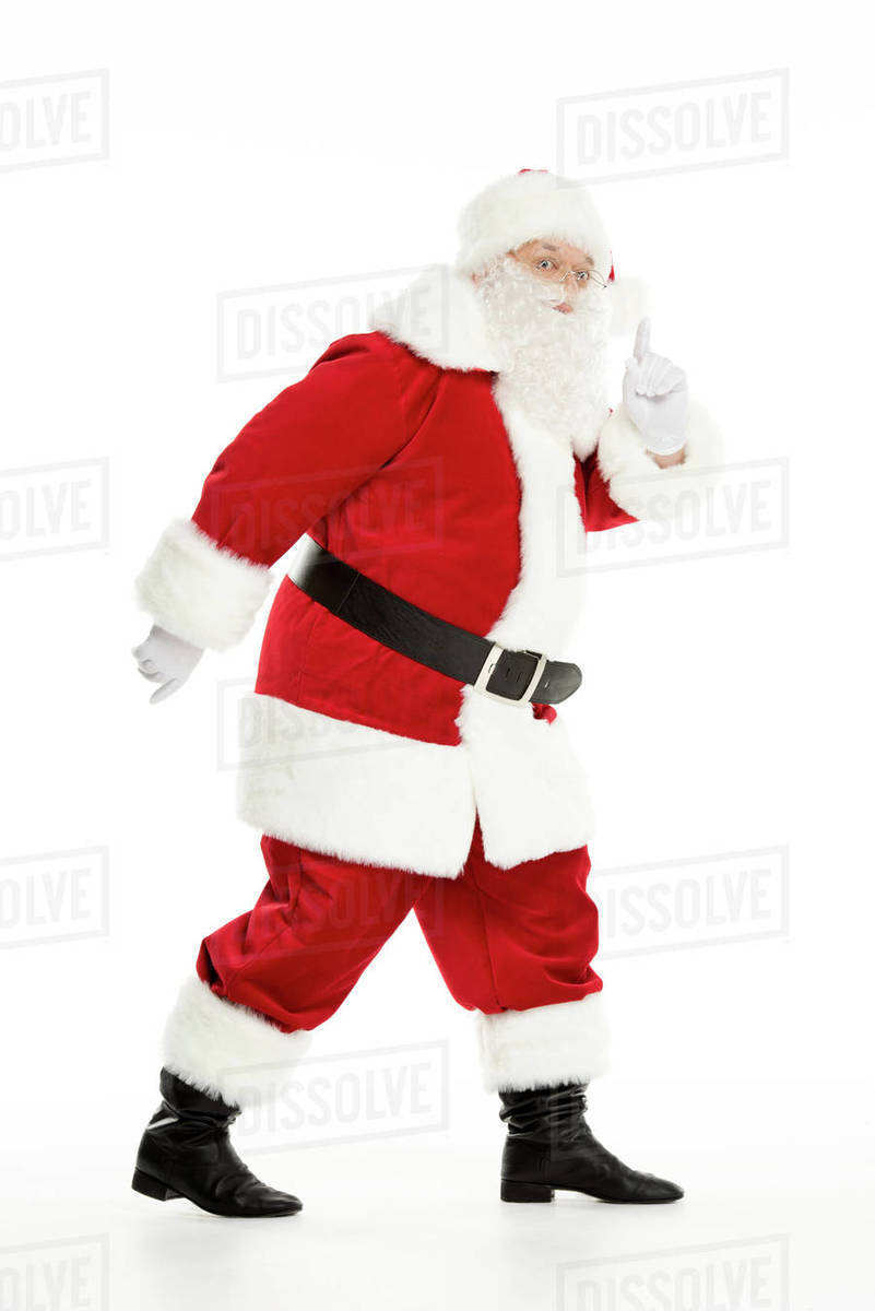 Full length view of Santa Claus posing and gesturing isolated on white ...