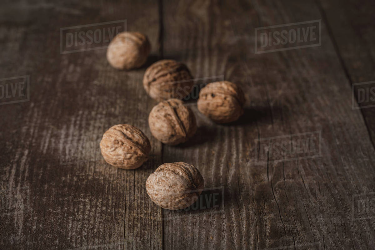 close up view of tasty walnuts on wooden surface - Royalty-free Stock ...