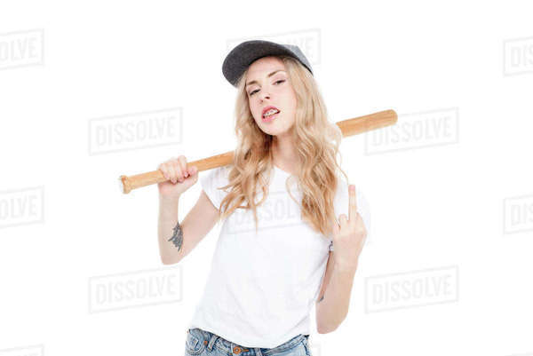 Half length shot of a young woman with a baseball bat showing the ...