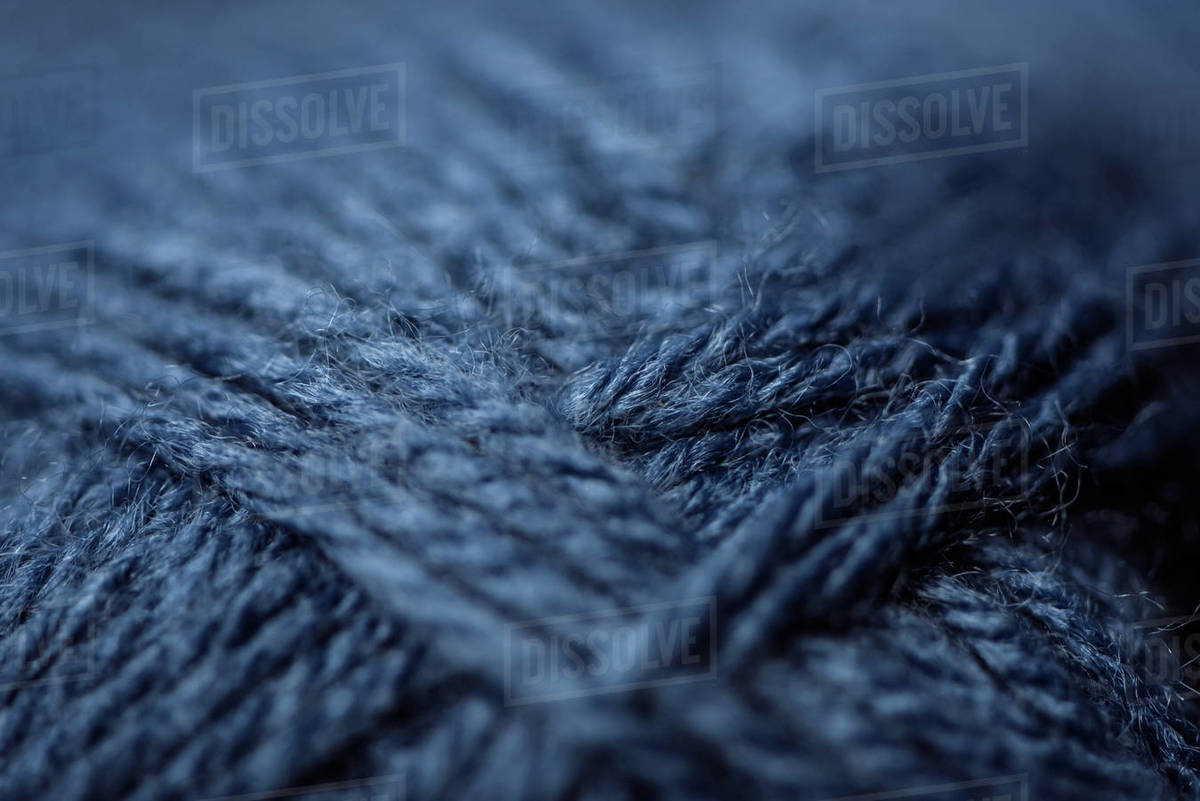 Full frame of blue yarn texture as background - Stock Photo - Dissolve