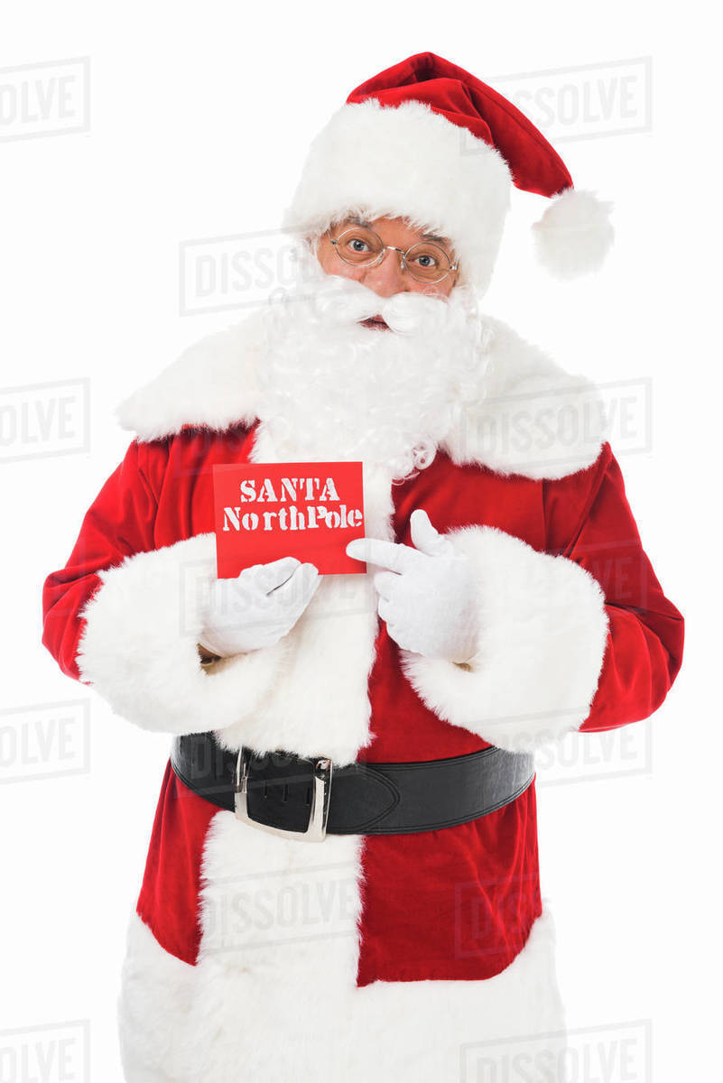 santa claus holding letter with inscription santa north pole and ...