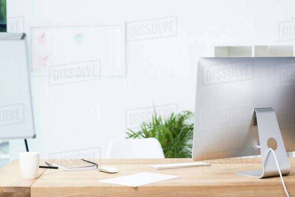 Stylish modern workplace with computer in office - Royalty-free Stock ...