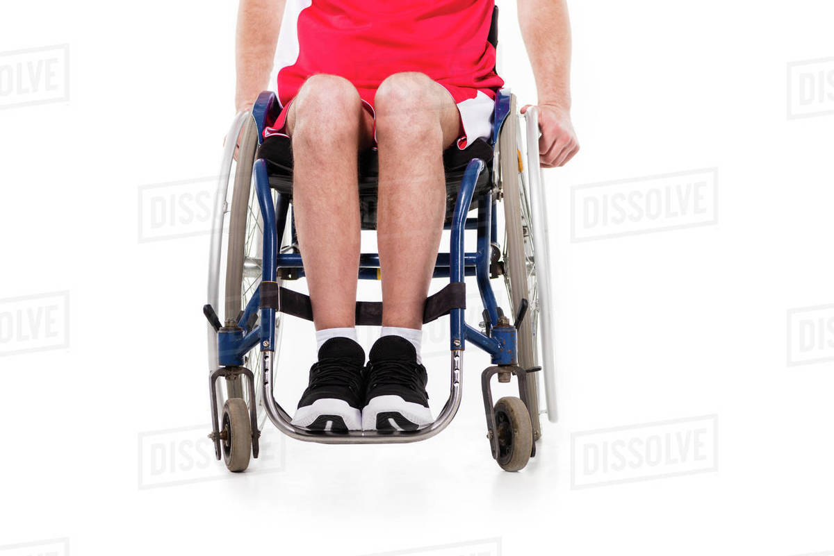 Cropped shot of physically handicapped sportsman in wheelchair isolated ...