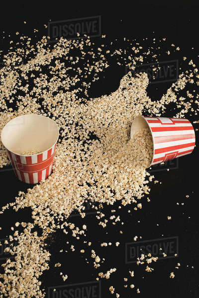 High angle view of popcorn spilled of cardboard buckets - Stock Photo ...