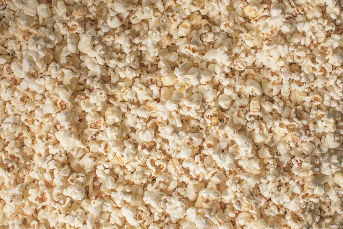 Top view of tasty popcorn texture - Stock Photo - Dissolve