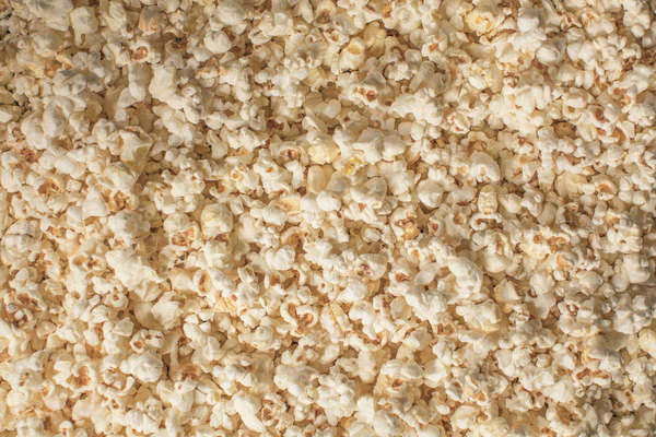Top view of tasty popcorn texture - Stock Photo - Dissolve