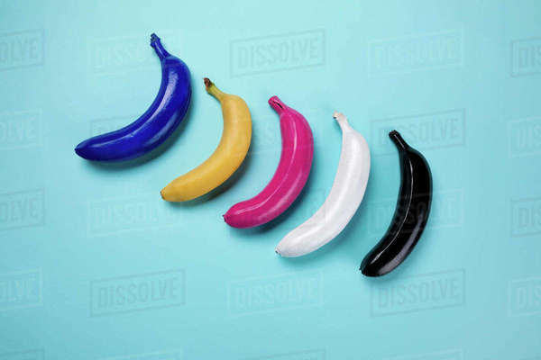 Top view of colorful bananas collection isolated on blue - Stock Photo ...