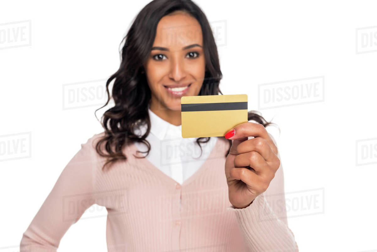 beautiful african american woman holding credit card and looking at ...