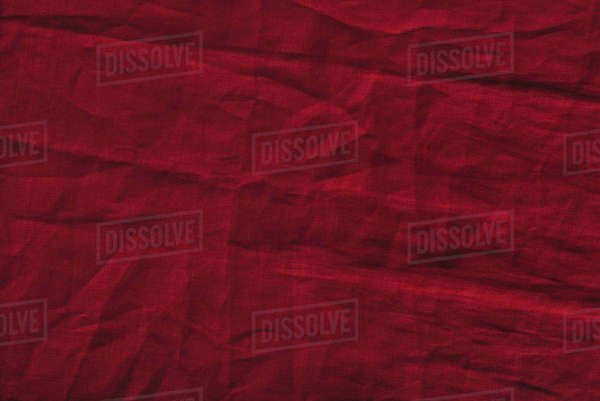 close up view of red marsala linen fabric texture - Stock Photo - Dissolve