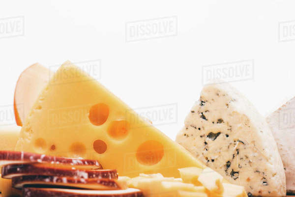 Close up view of different types of cheese isolated on white - Royalty ...