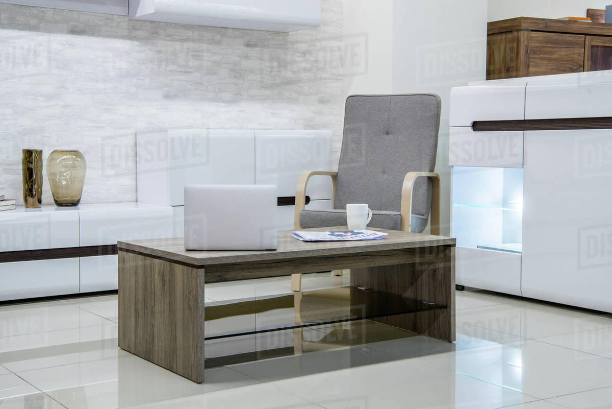 Modern living room interior with laptop on table - Royalty-free Stock ...