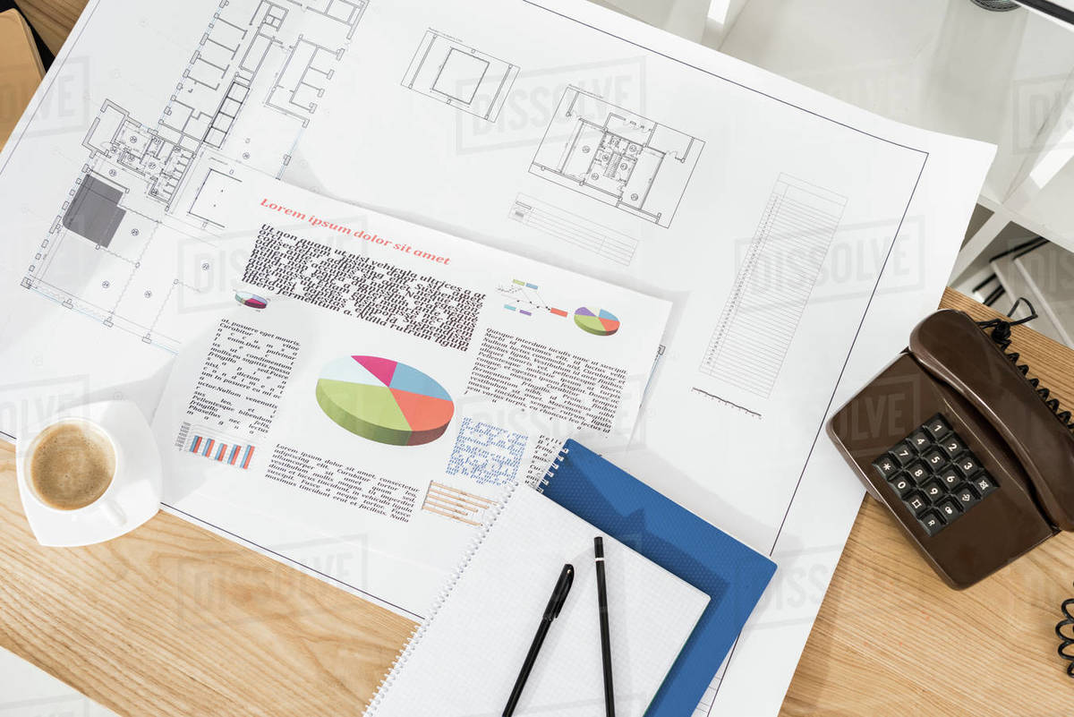 Top view of blueprints and plans on wooden table - Royalty-free Stock ...