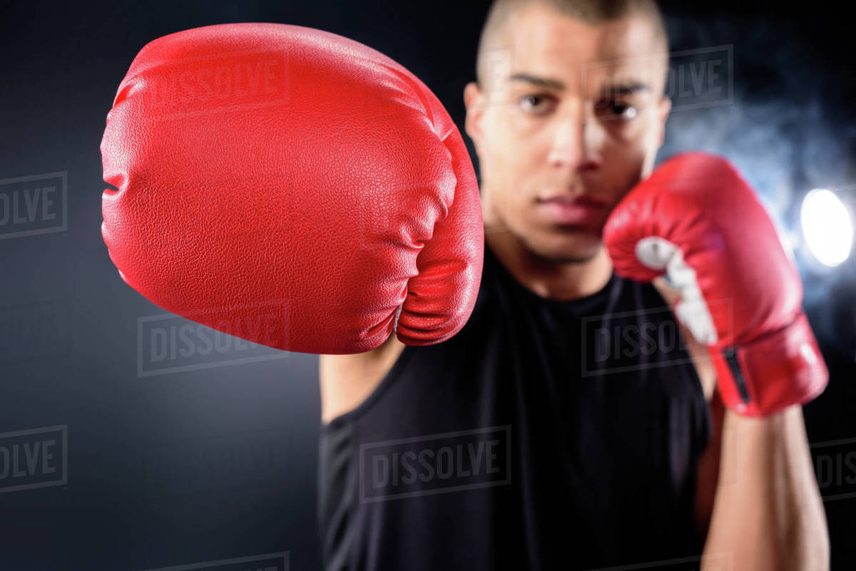 handsome african american boxer making hit on black - Stock Photo ...