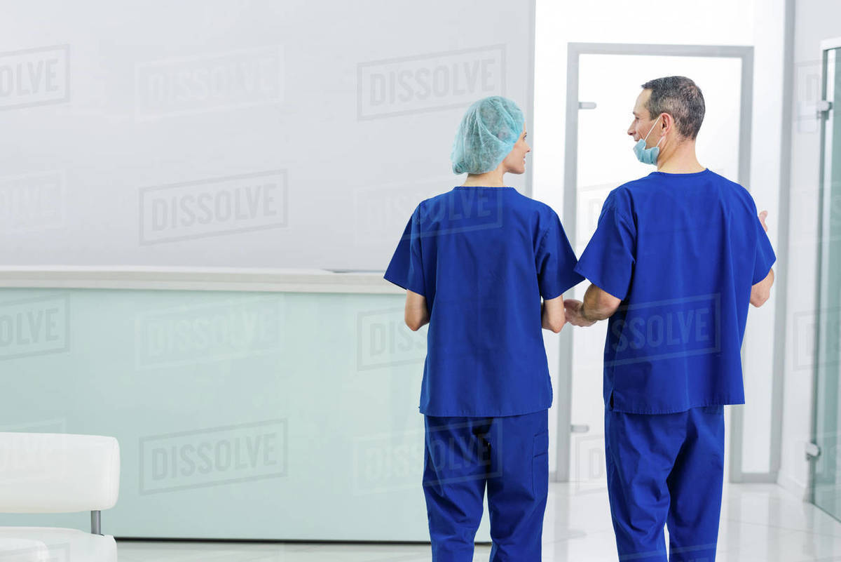 two surgeons discussing diagnosis in hospital - Royalty-free Stock ...