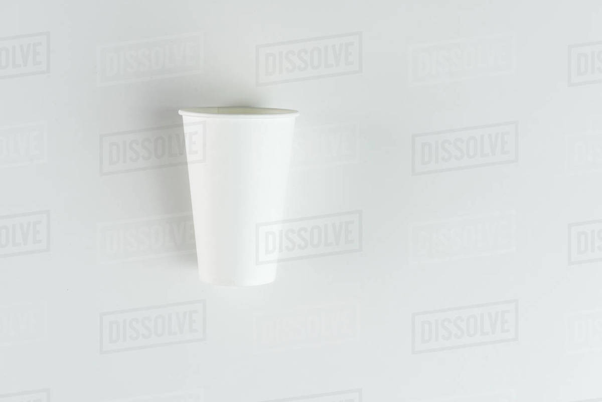 Top view of plastic disposable cup isolated on grey - Royalty-free ...