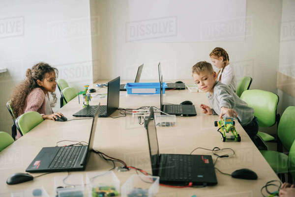 kids working on projects at machinery class - Royalty-free Stock Photo ...