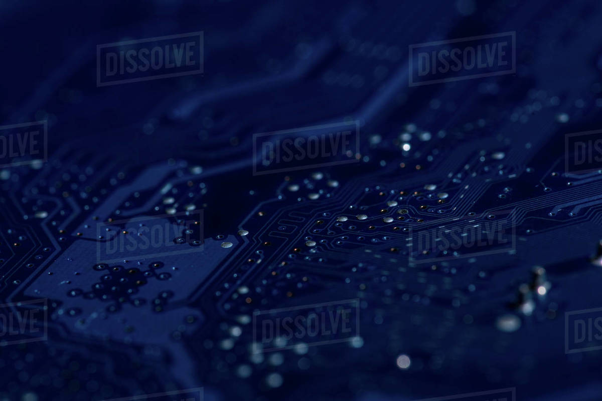 close up view of computer motherboard elements - Stock Photo - Dissolve