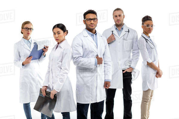 Group of young confident professional doctors standing together ...