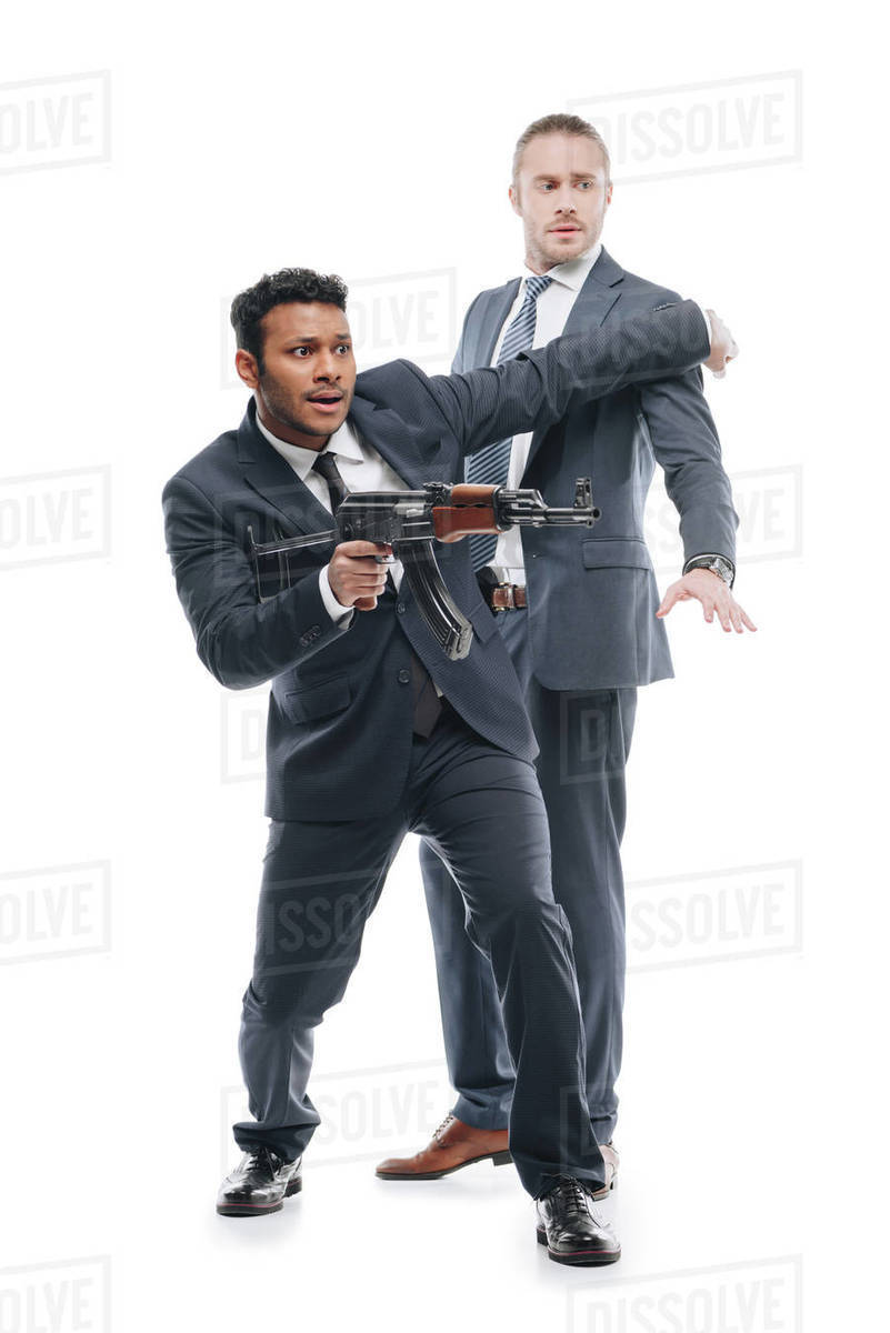 African american bodyguard with rifle and client, isolated on white ...