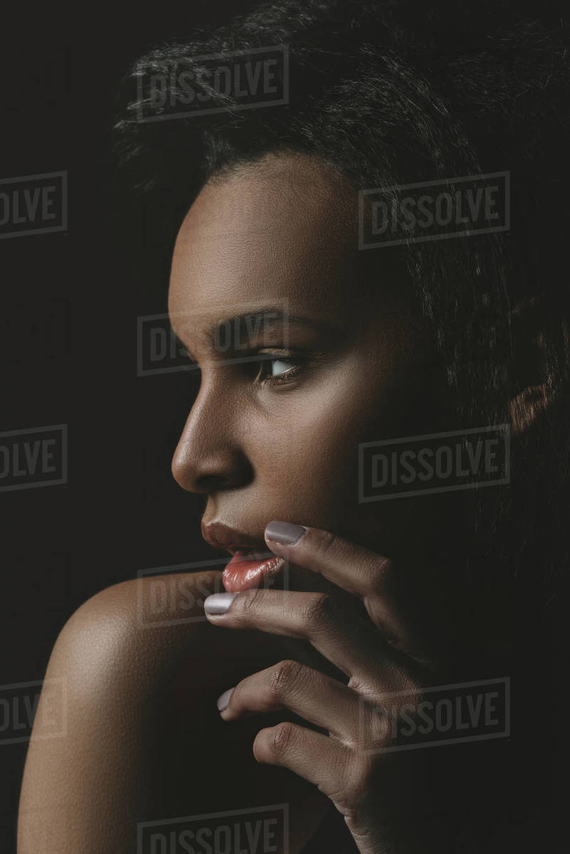 Attractive sensual afro girl posing for fashion shoot, isolated on ...
