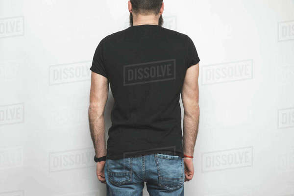Back view of man in black t-shirt isolated on white - Royalty-free ...