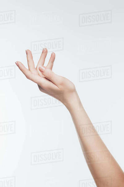 Cropped shot of female hand with perfect skin isolated on white ...