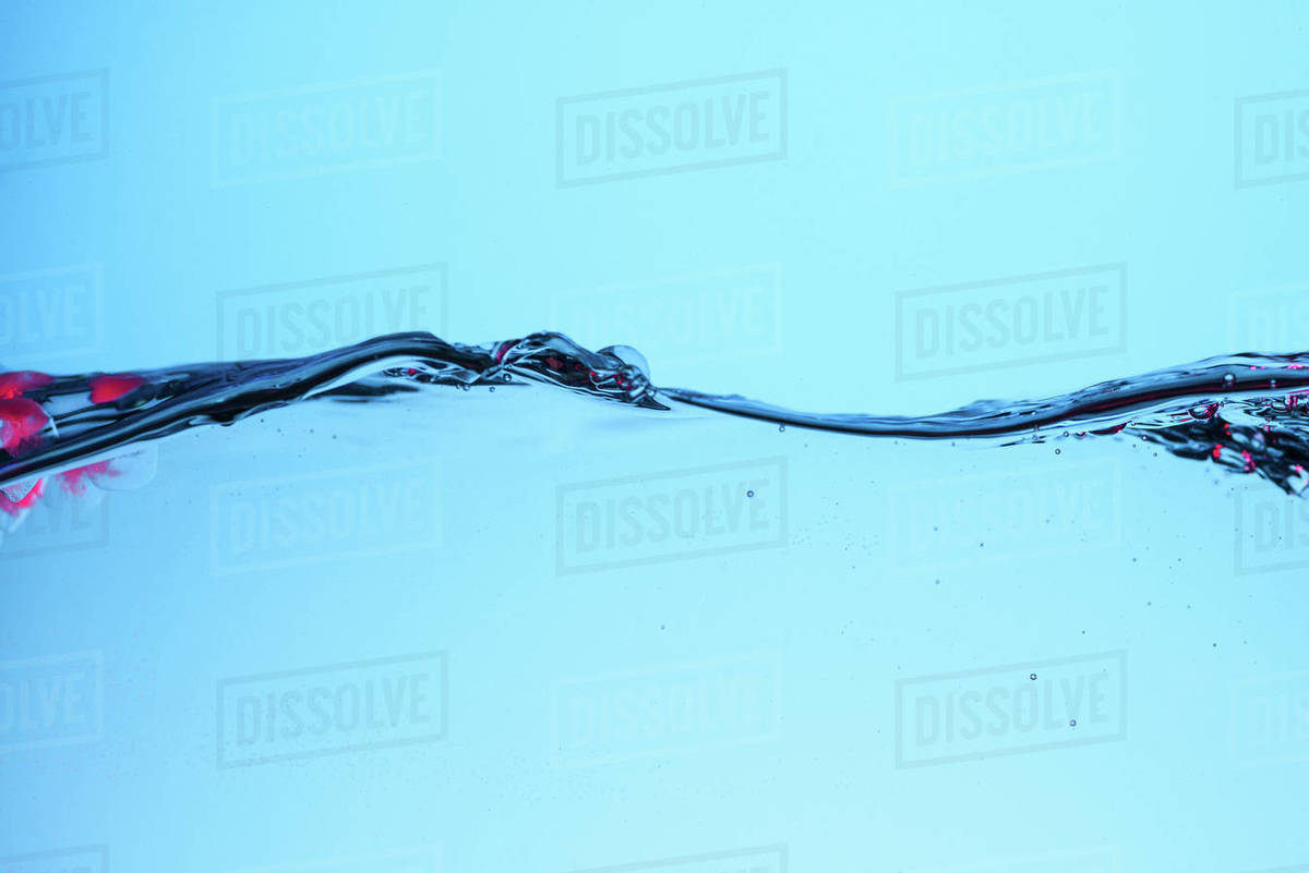 Minimalistic texture with flowing water, isolated on blue - Stock Photo ...